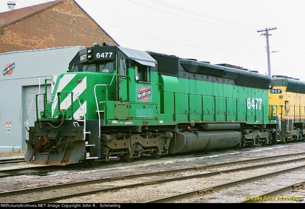 CNW 6477 (ex BN SD45 6477) at Oelwein IA. 11/15/1989 (photos date approximate)
